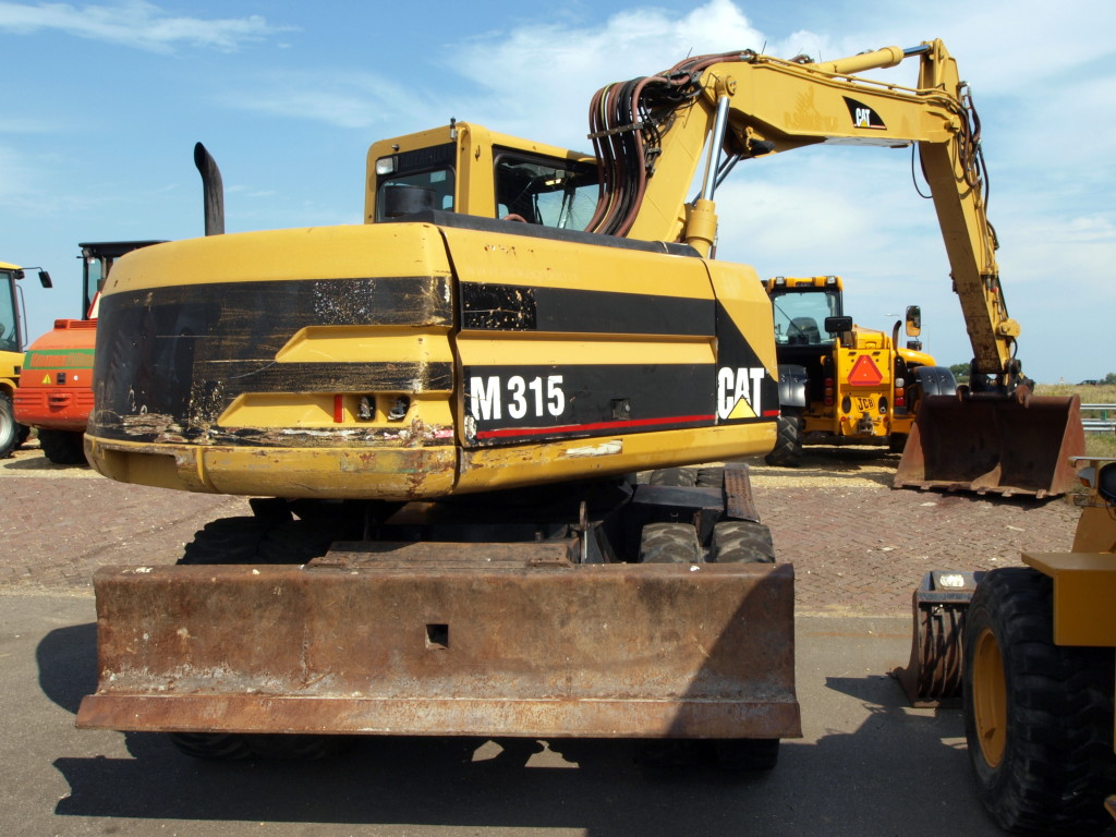 Buckle up yourself while operating the Cat M315 excavator